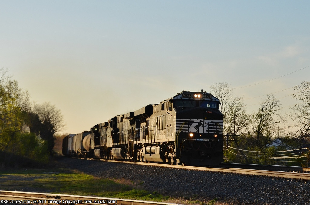 NS 7639 runs from the setting sun.